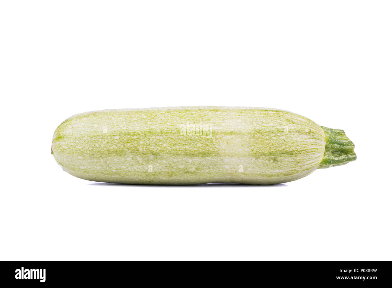 One green vegetable marrow on a white background Stock Photo - Alamy