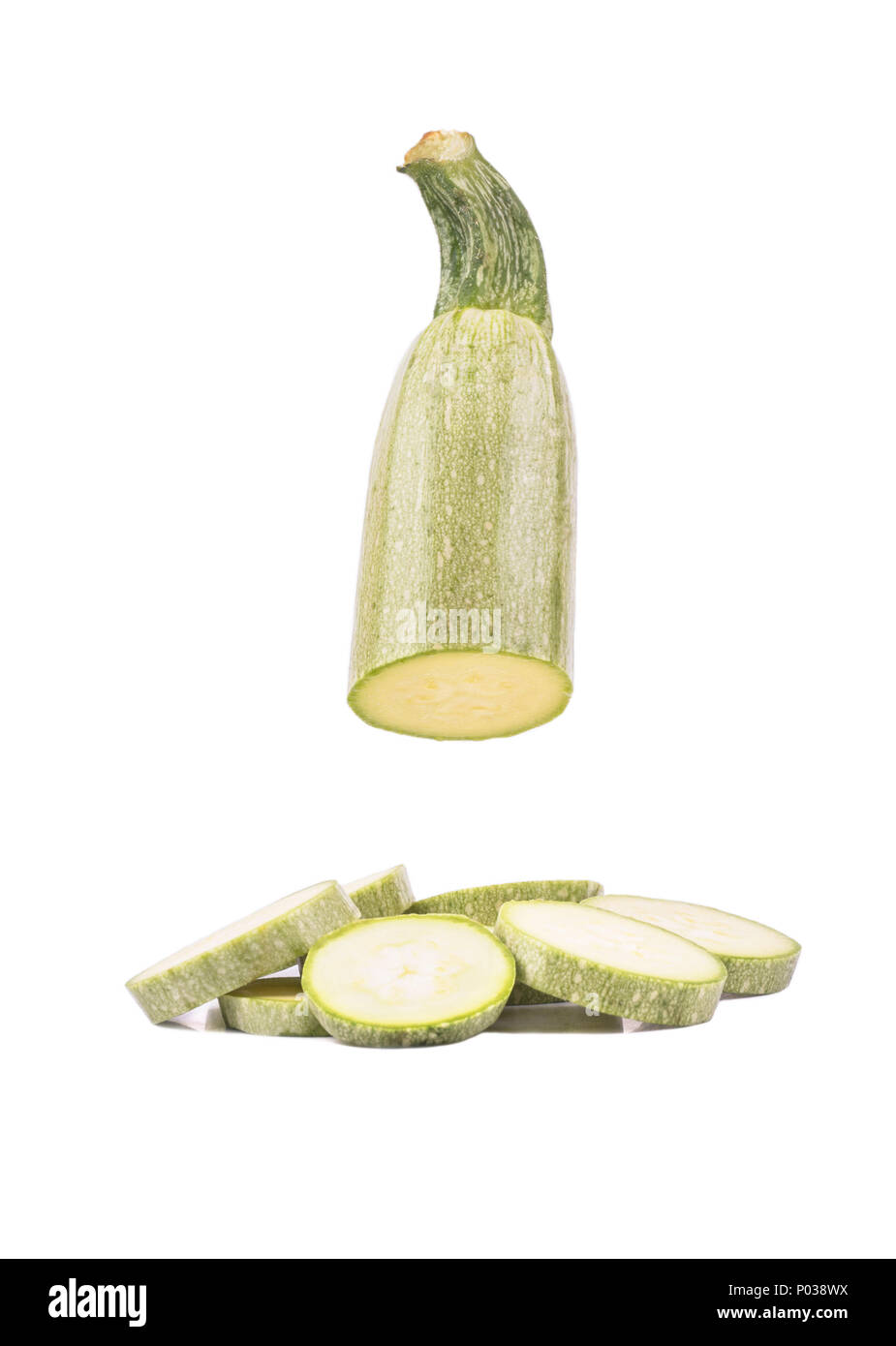 Hangs in the air vegetable marrow with sliced on a white background ...