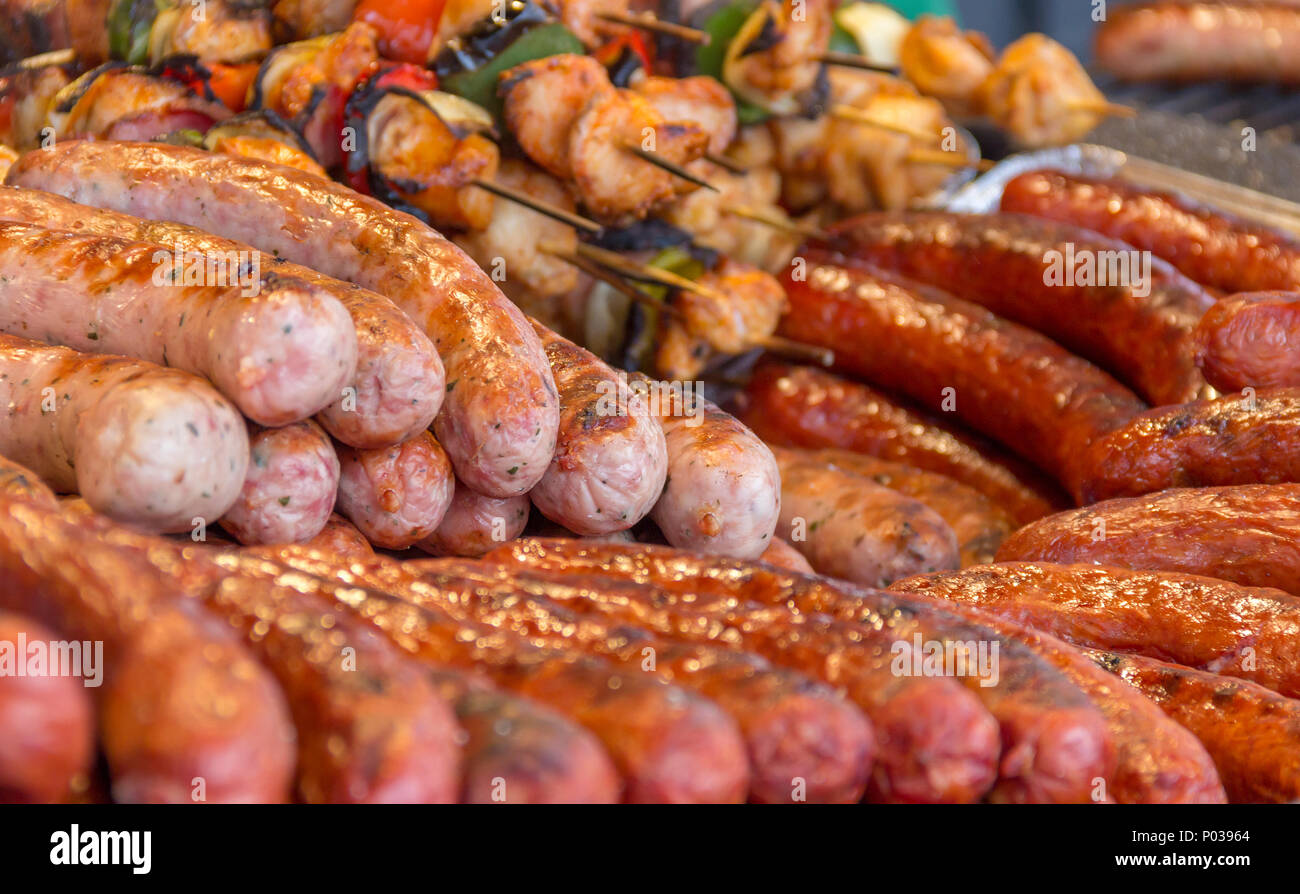 barbecue scenery with lots of various roasted sausages Stock Photo - Alamy