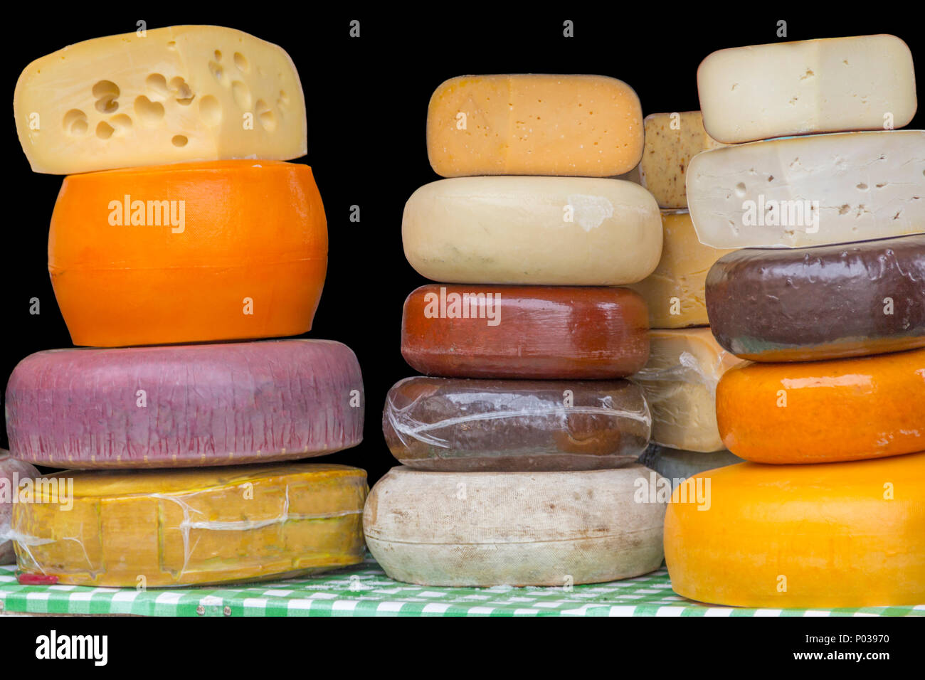variety of cheeses isolated in black back Stock Photo - Alamy