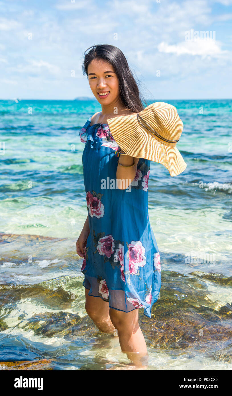 Woman wearing dress in water hi-res stock photography and images - Alamy