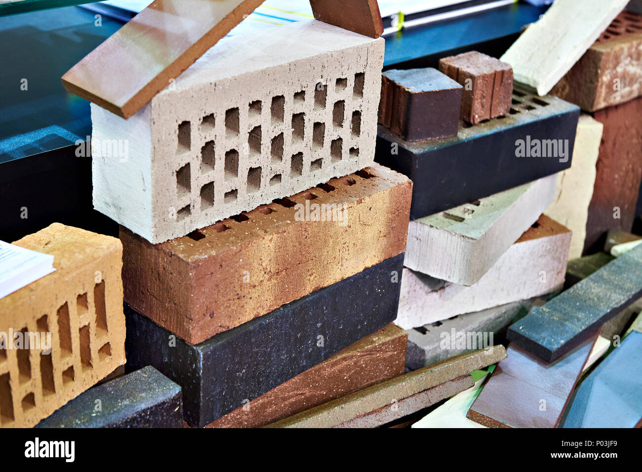 Bunch of different bricks for construction Stock Photo - Alamy