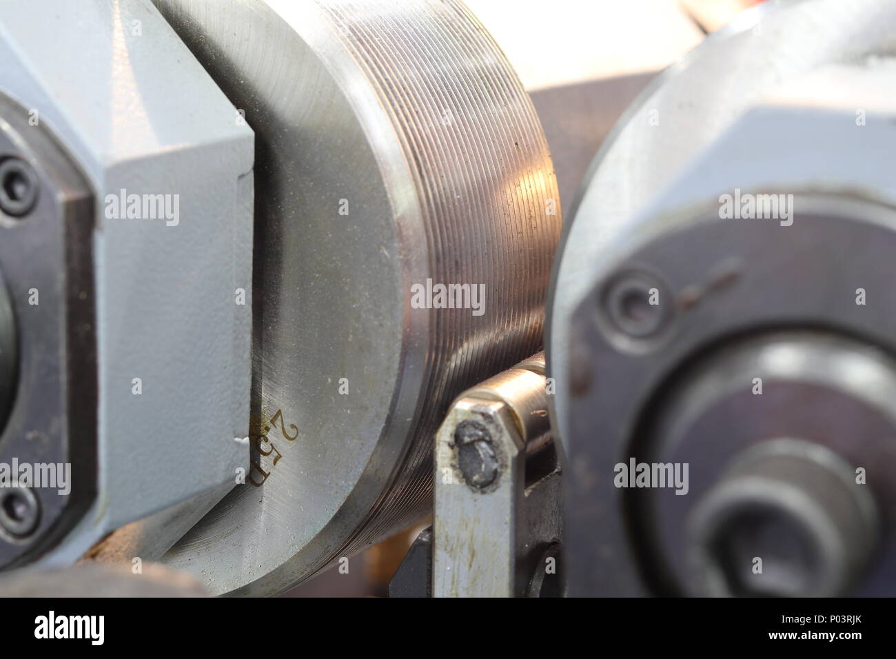 Thread rolling machine , for making thread of pipe Stock Photo - Alamy