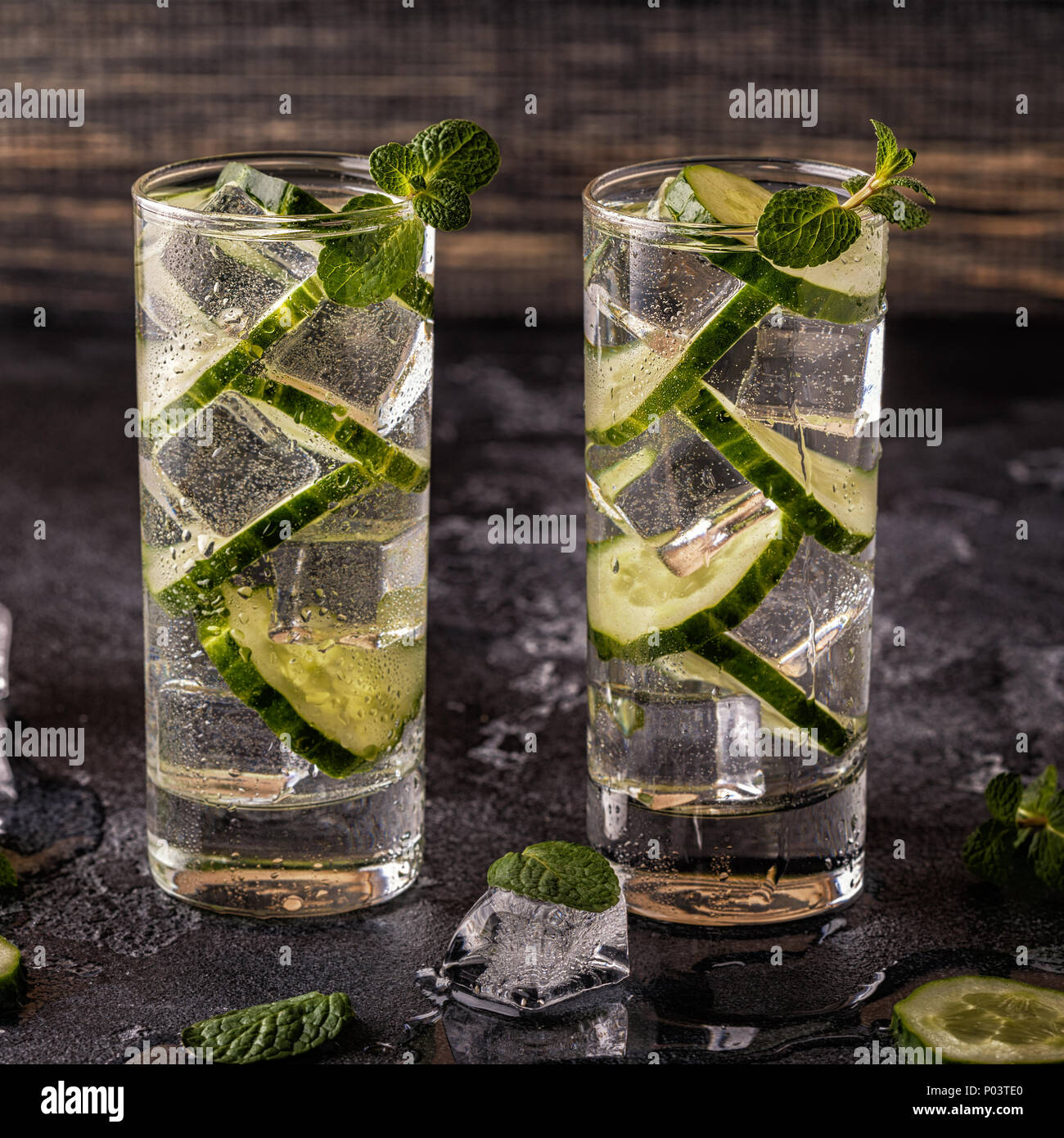 Cold and refreshing infused detox water with cucumber Stock Photo - Alamy
