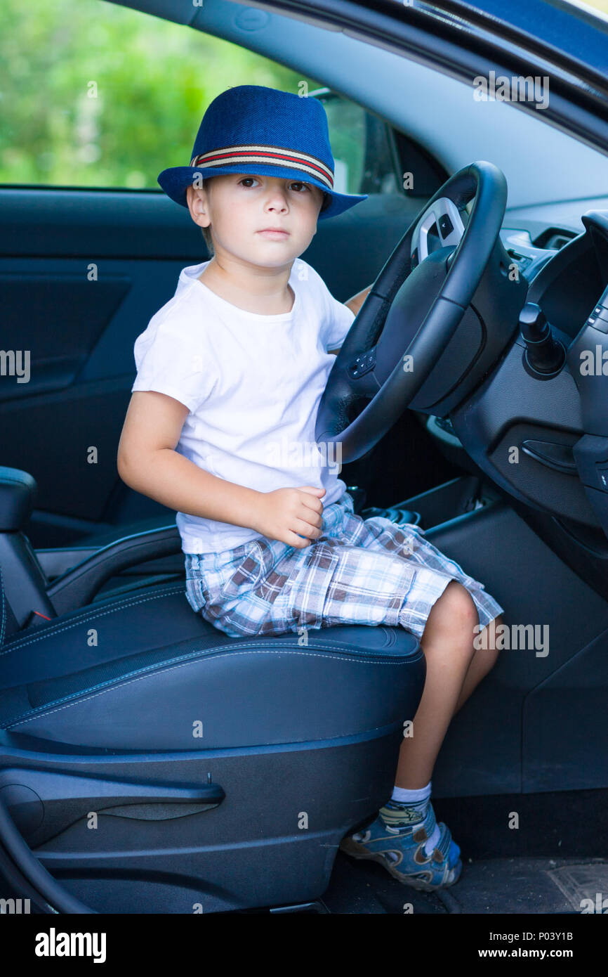 Cute driver in car Stock Photo - Alamy