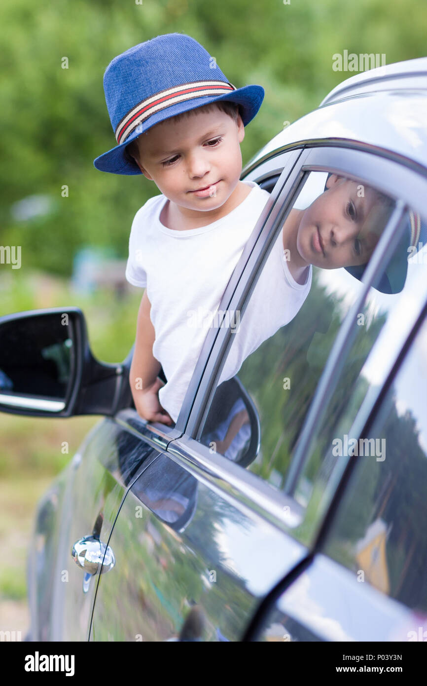 Cute driver in car Stock Photo - Alamy