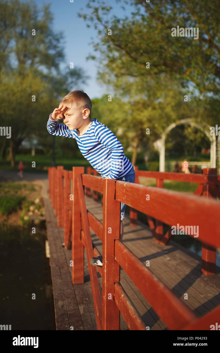 little boy looks into the distance Stock Photo - Alamy