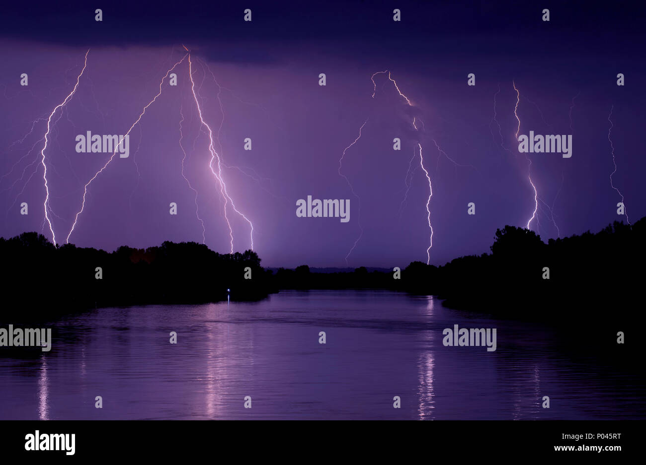 Summer Thunderbolt Night Storm over River at Night Stock Photo - Alamy