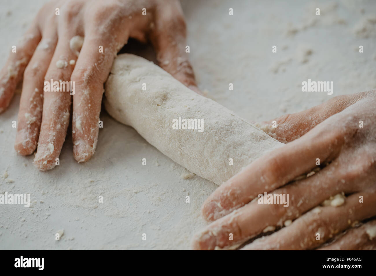 Baker makes dough making cake hi-res stock photography and images - Alamy
