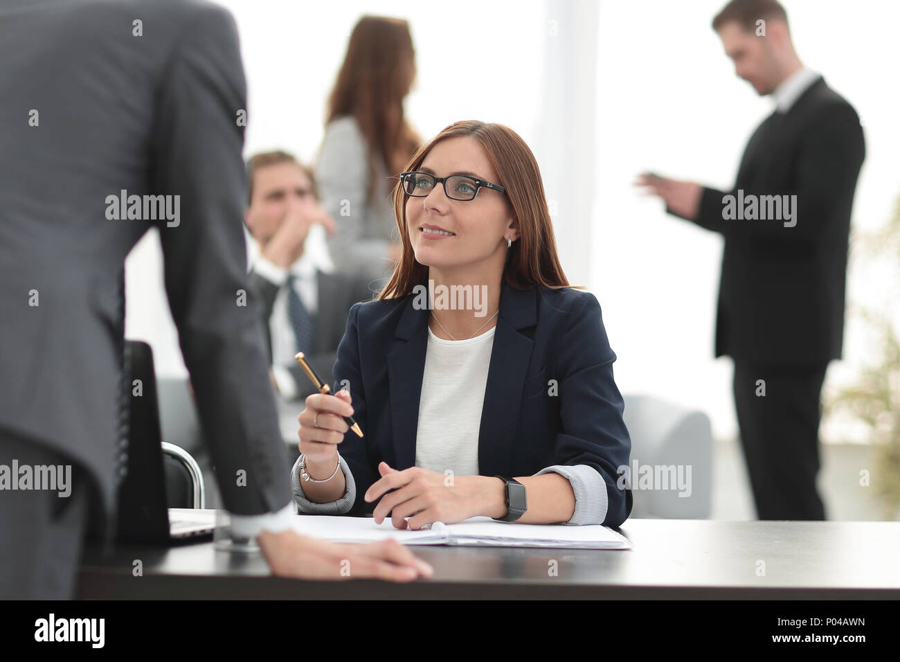 Successful businesswoman explaining something hi-res stock photography ...