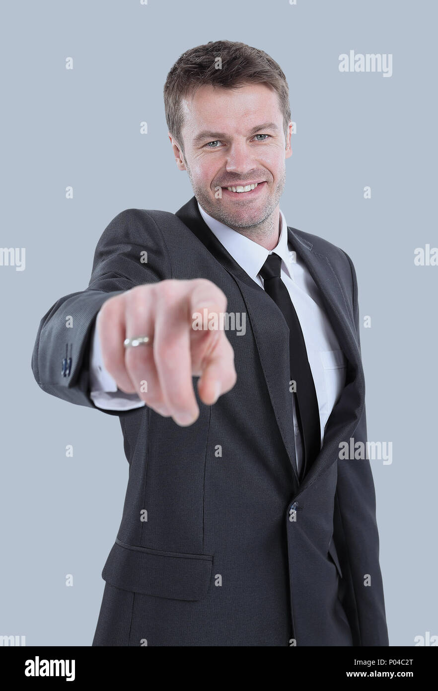 Portrait of a young man pointing his finger at you Stock Photo - Alamy