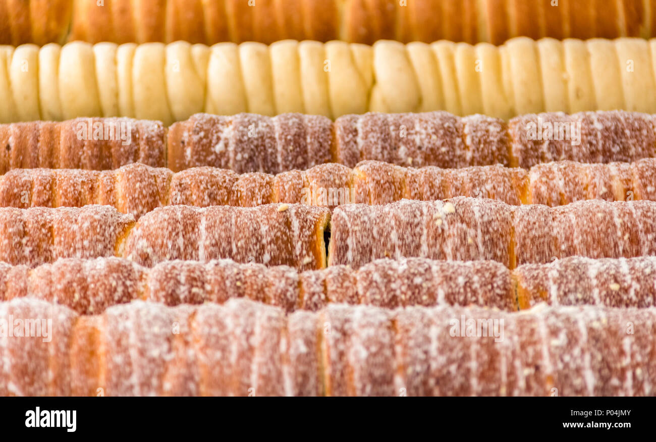 mostly central european spit cake speciality named Trdelnik rotating on ...