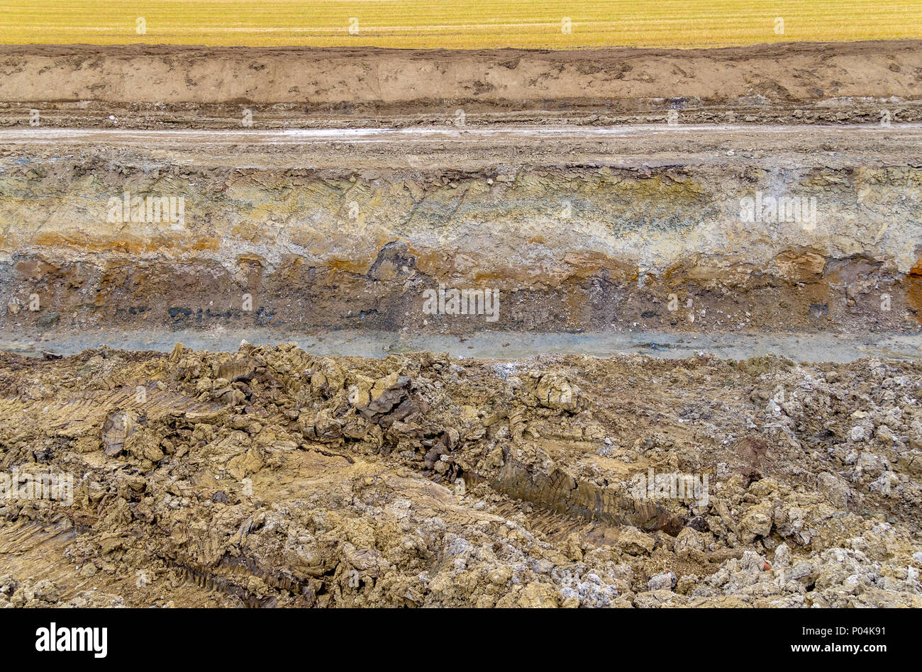 big ditch in layered soil structure Stock Photo - Alamy