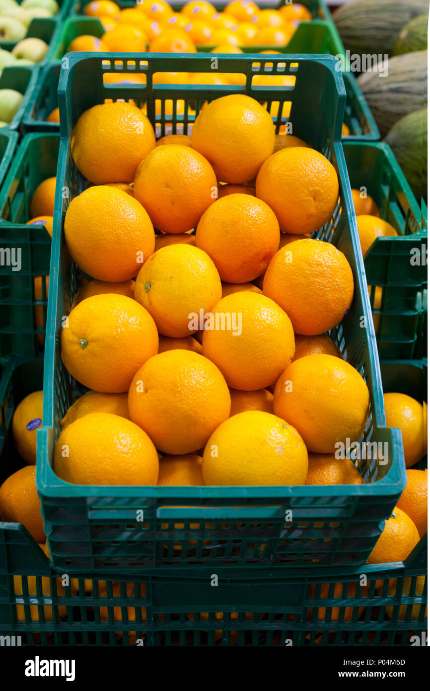 Many oranges in the box Stock Photo - Alamy
