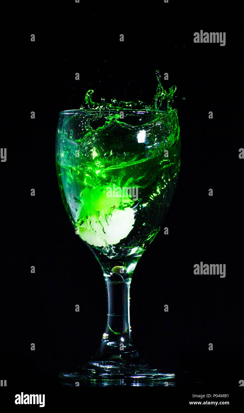 Pour green water into a glass,Water splash in glass Stock Photo - Alamy