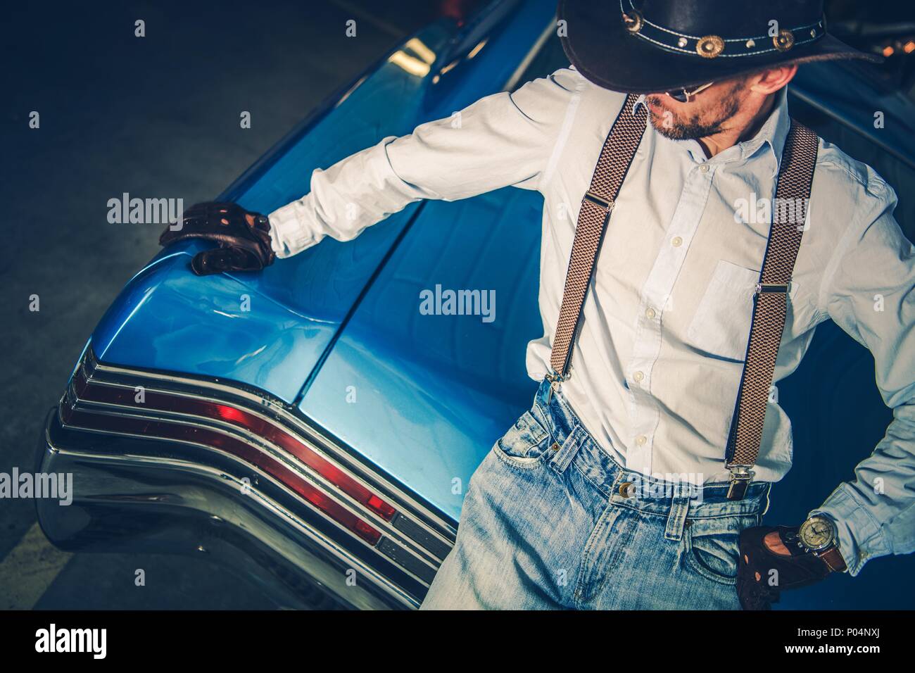 Young Cowboy Driver and His Muscle Classic Car. American Style Driving ...