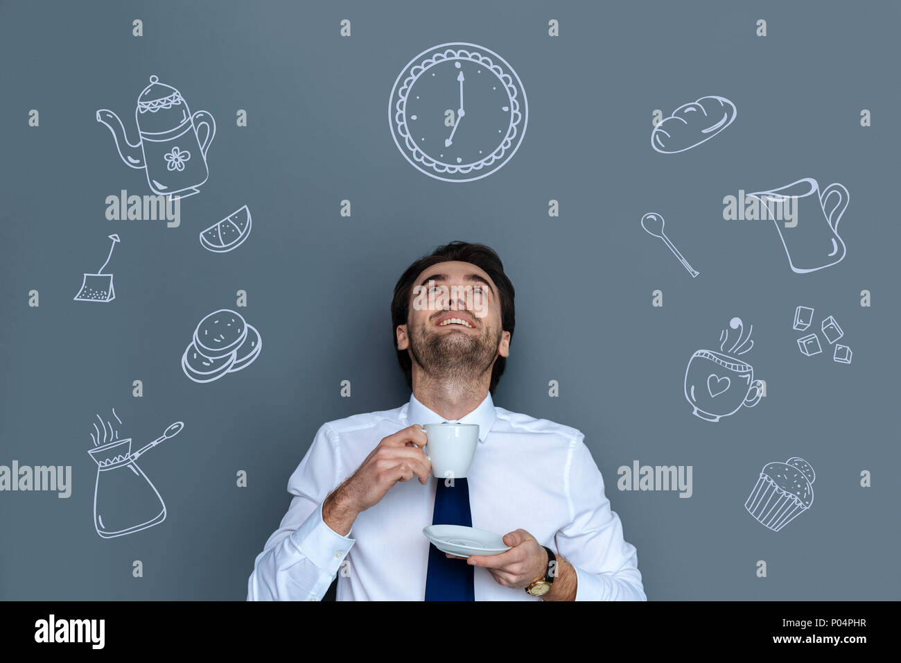 Cheerful man looking at the clock while being in a new cafe Stock Photo ...