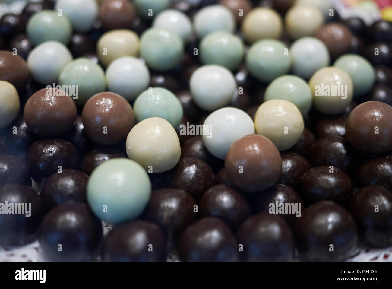 Assorted chocolate spheres Stock Photo - Alamy