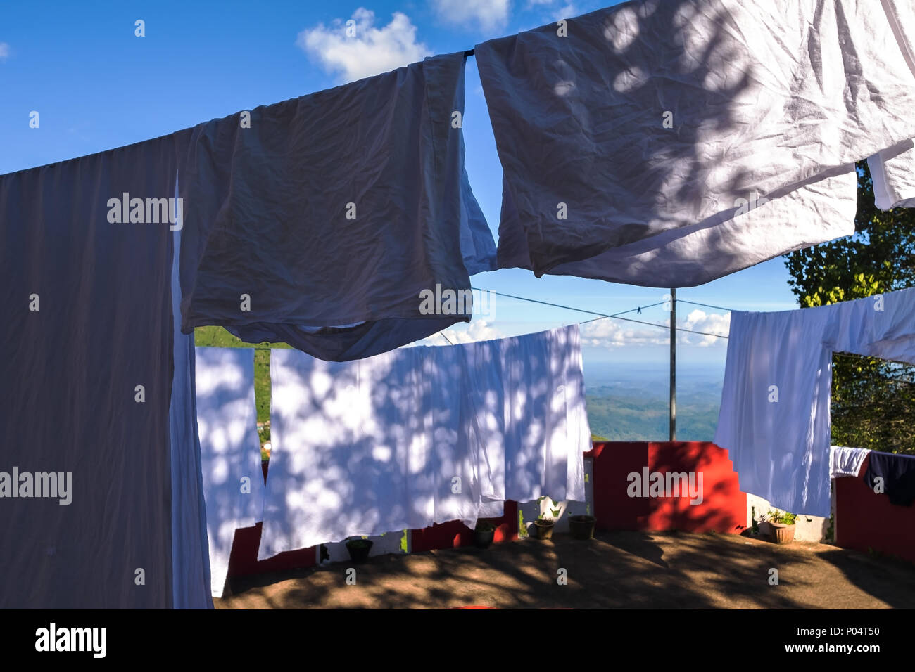 White sheets clothesline hi-res stock photography and images - Alamy