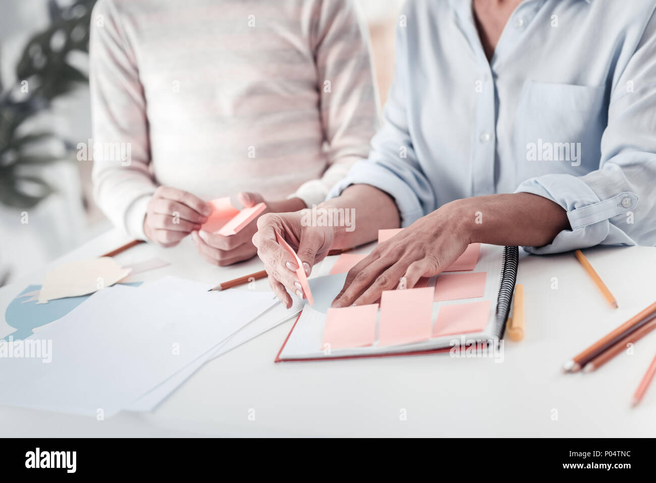 Holding sticker hi-res stock photography and images - Alamy