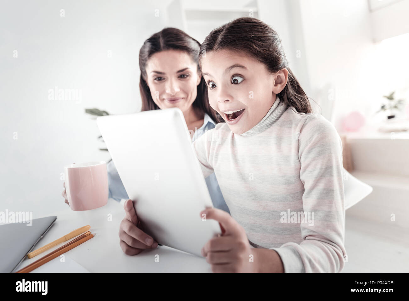 Surprised kid showing her emotions Stock Photo - Alamy