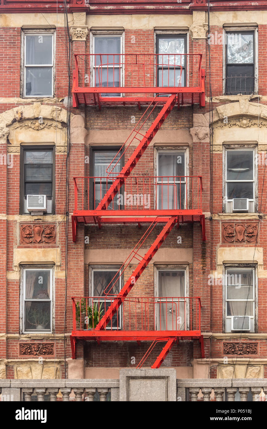 Red fire escape of an apartment building in New York city Stock Photo - Alamy