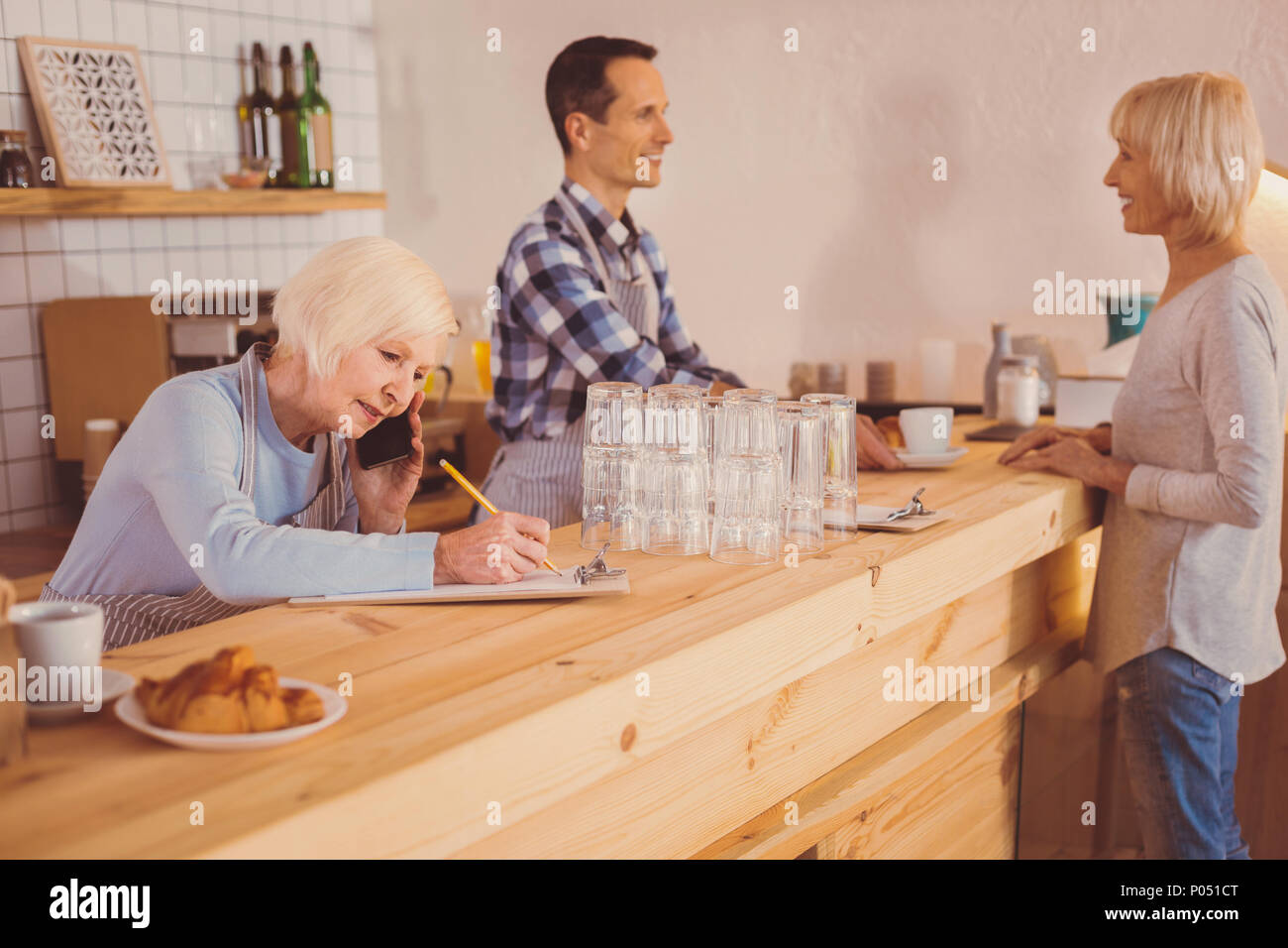 Placing order hi-res stock photography and images - Alamy