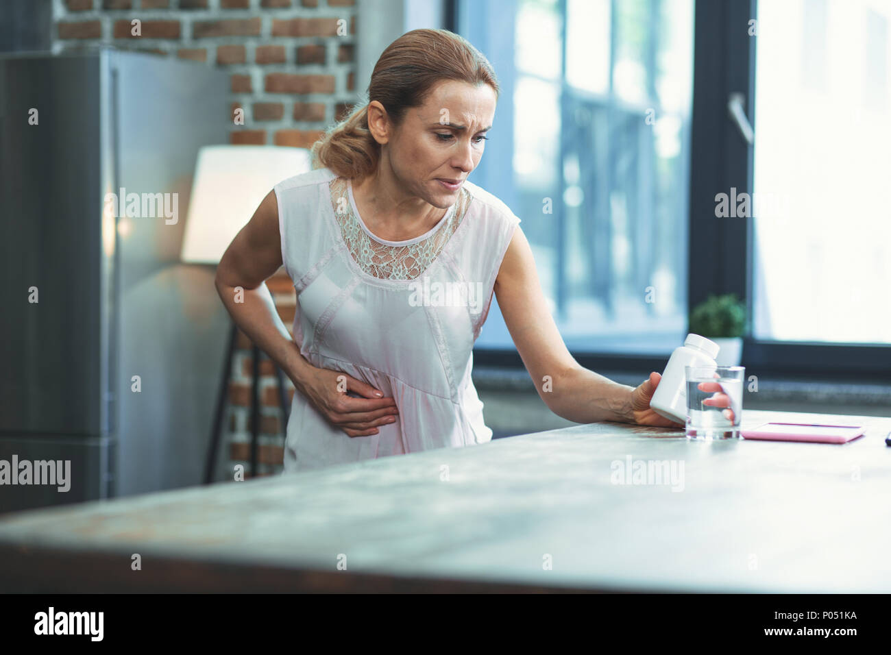 Relieving pain hi-res stock photography and images - Alamy