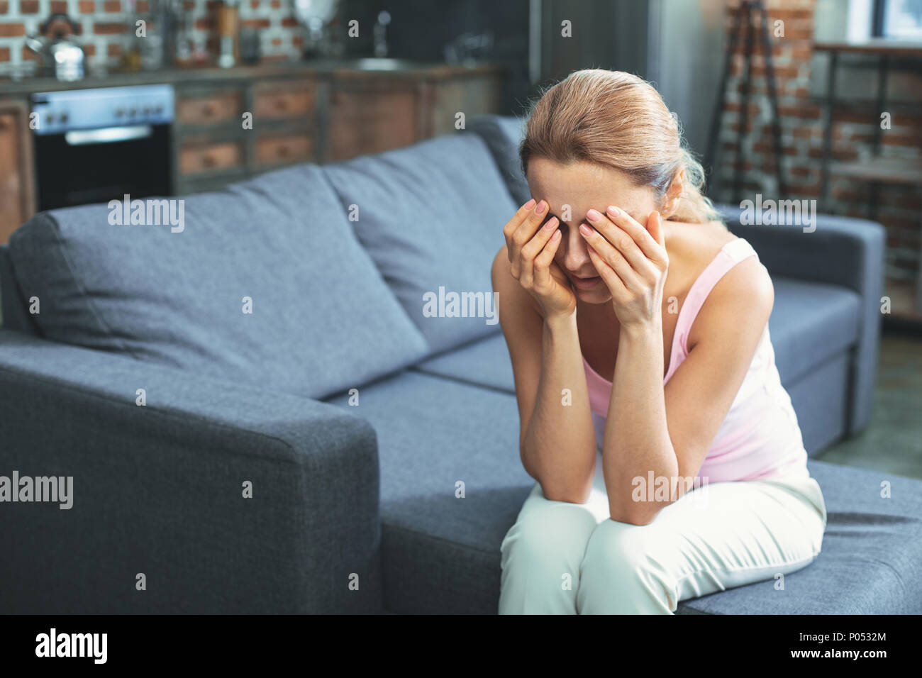 Upset mature woman facing guilt Stock Photo - Alamy