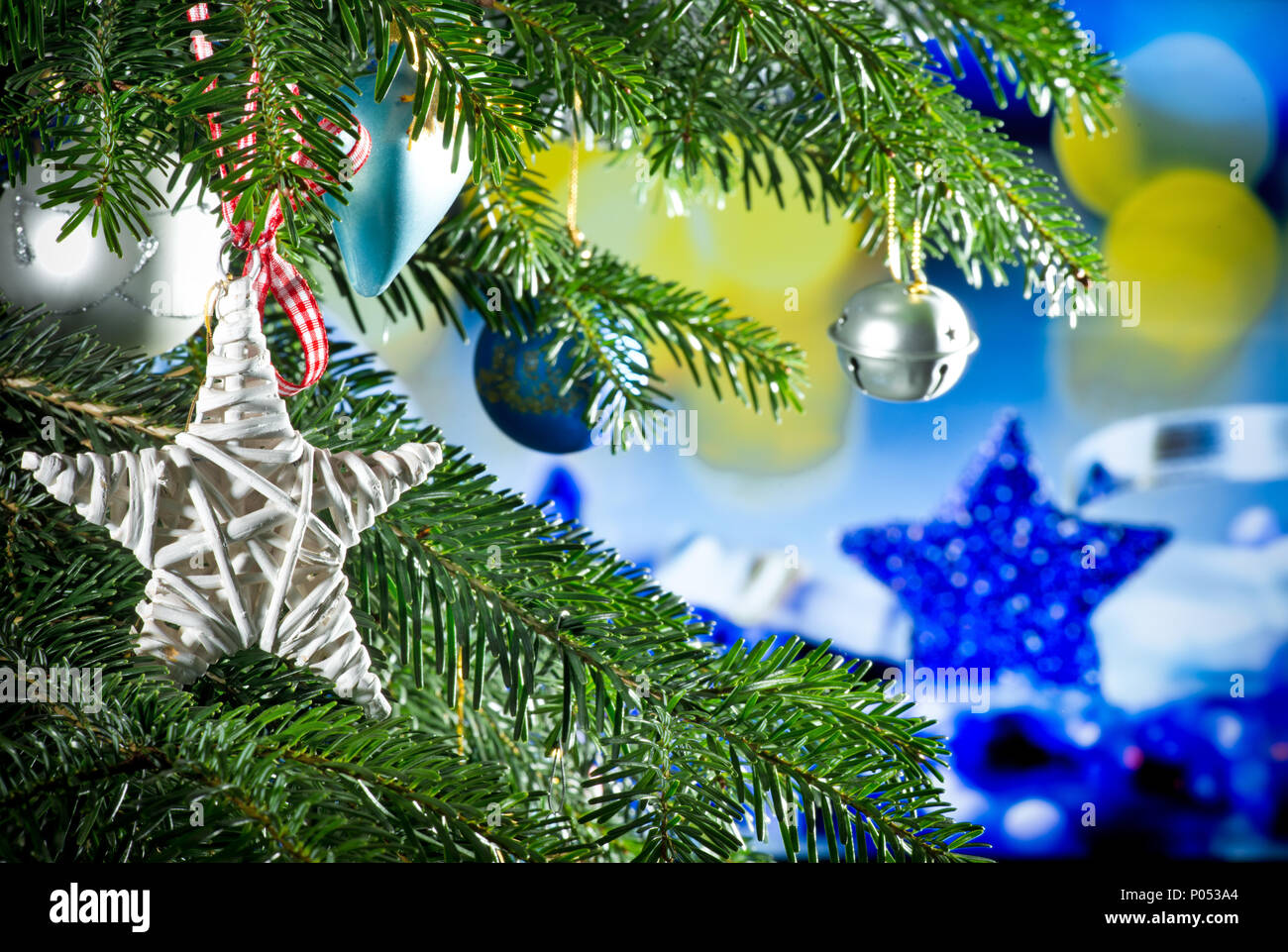 Christmas Background with Christmas Star on the Tree Stock Photo - Alamy