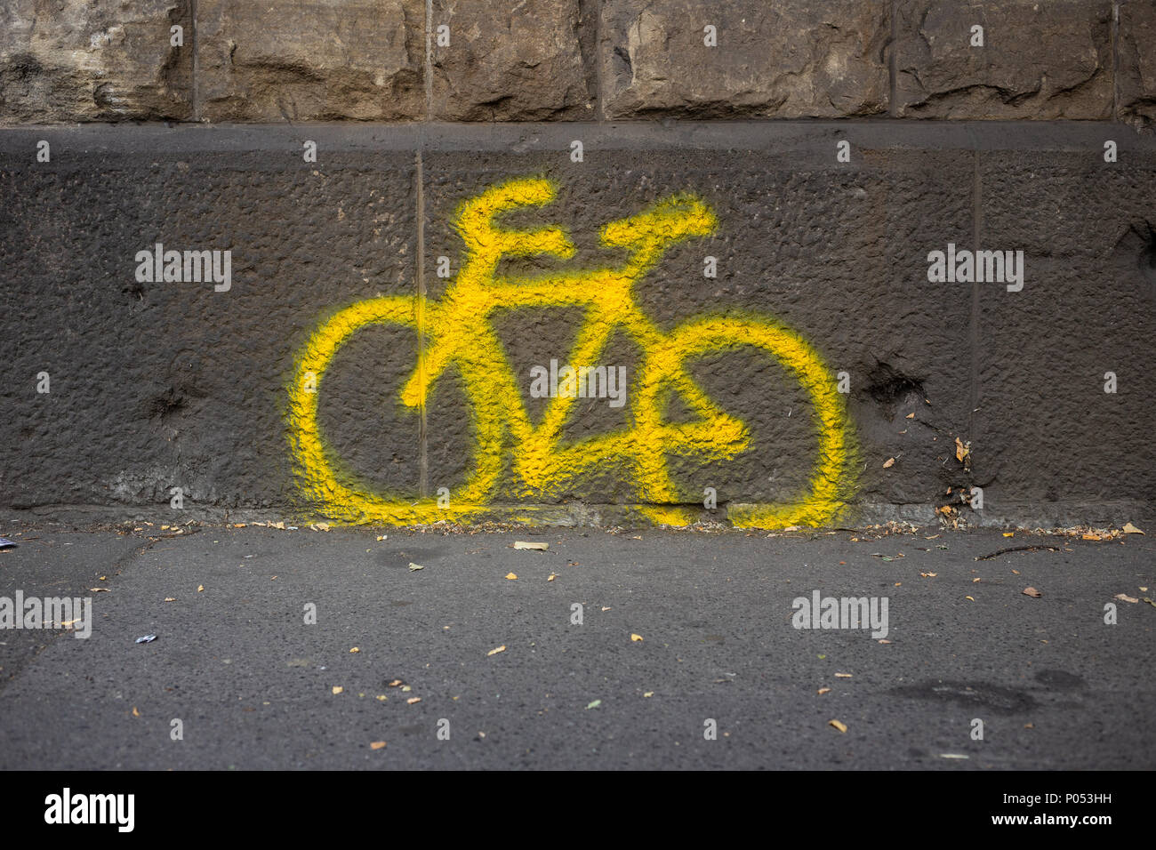 Yellow bicycle symbol hi-res stock photography and images - Alamy