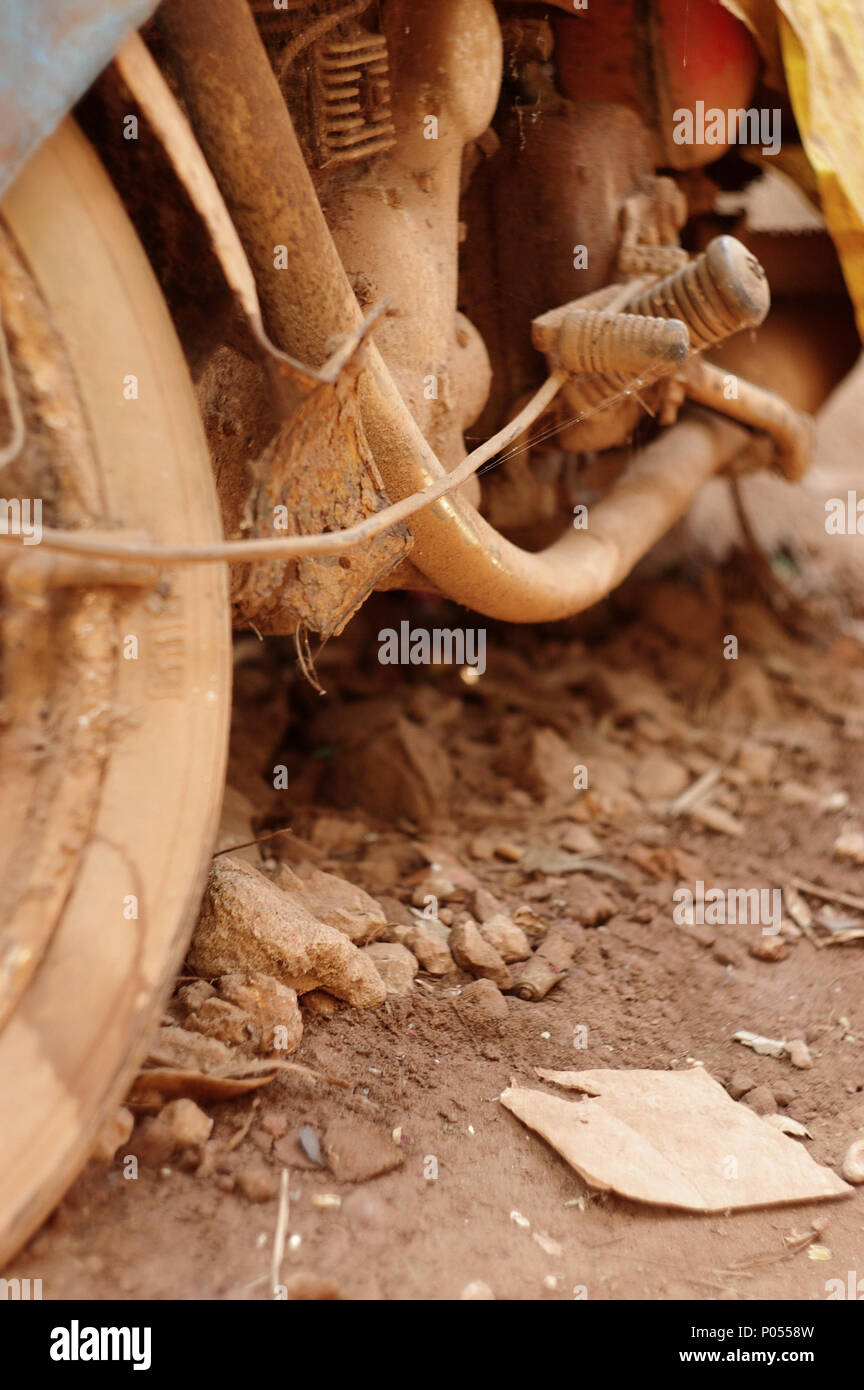 Old abandoned motorcycle with rusty components in the dust Stock Photo ...