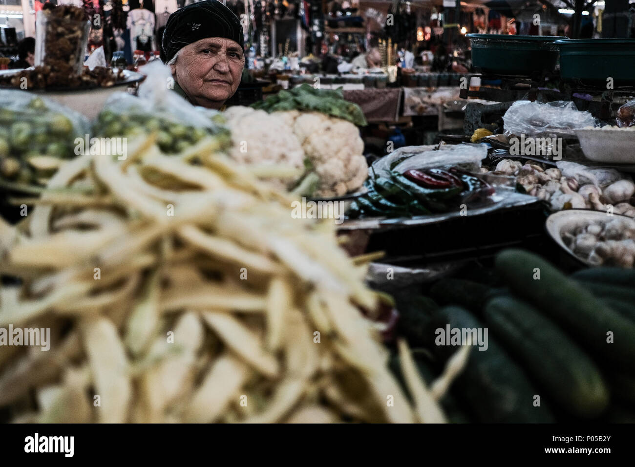 Shopkeepers sell their merchandise in the Kutaisi Bazaar, Georgia Stock ...
