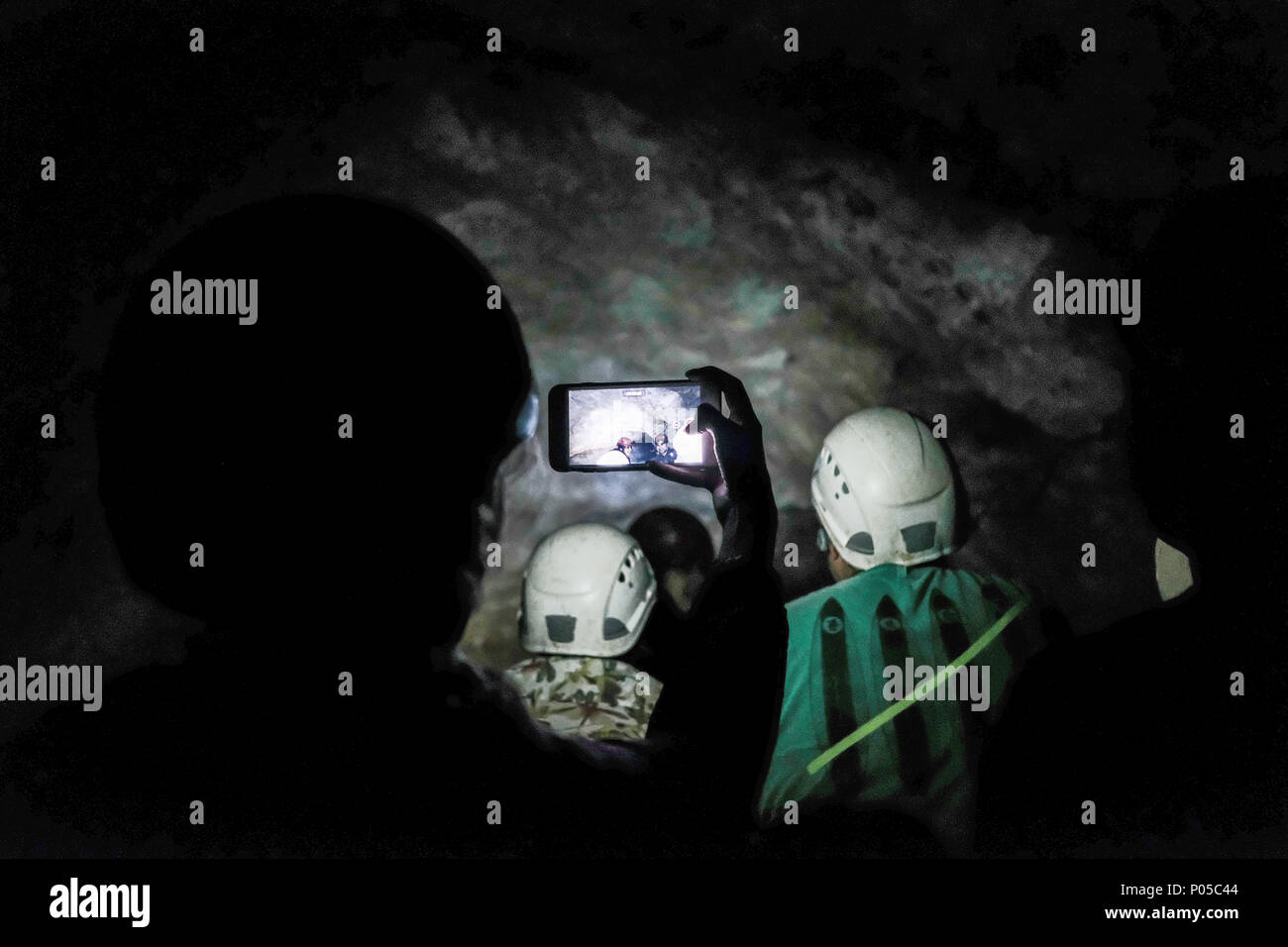 Visitors enjoy a subterranean boat ride in the Prometheus Cave near ...