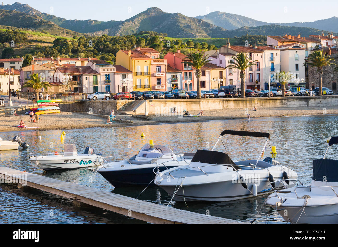 COLLIURE, FRANCE - JULY 5, 2016: Beach with boats and hotel restaurant ...