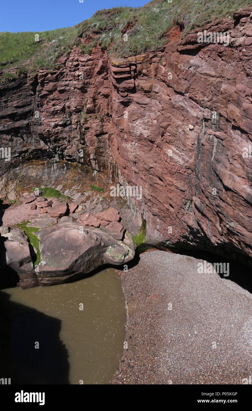 Small enclosed beach with cliff Seaton Cliffs Angus Scotland June 2018 ...