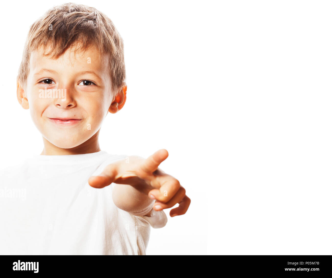 little cute white boy pointing in studio isolated close up Stock Photo ...
