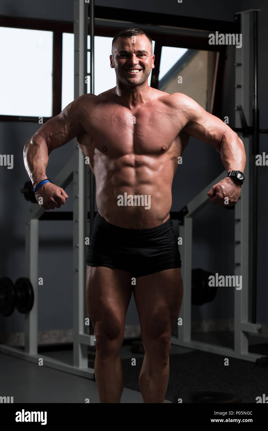 Portrait Of A Young Physically Fit Man Showing His Well Trained Body ...