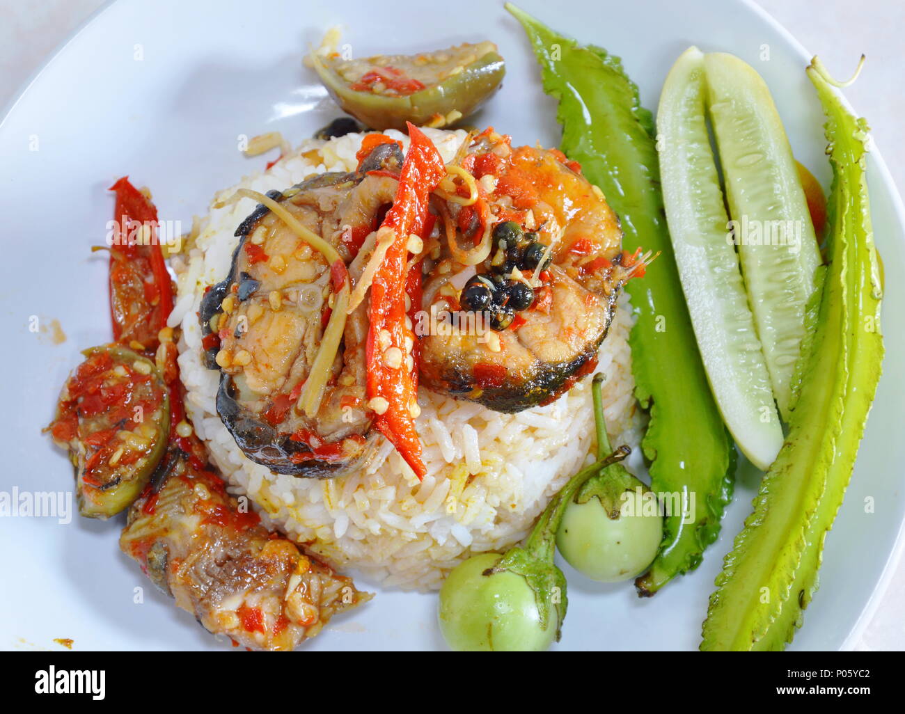 spicy stir fried catfish on rice Stock Photo - Alamy