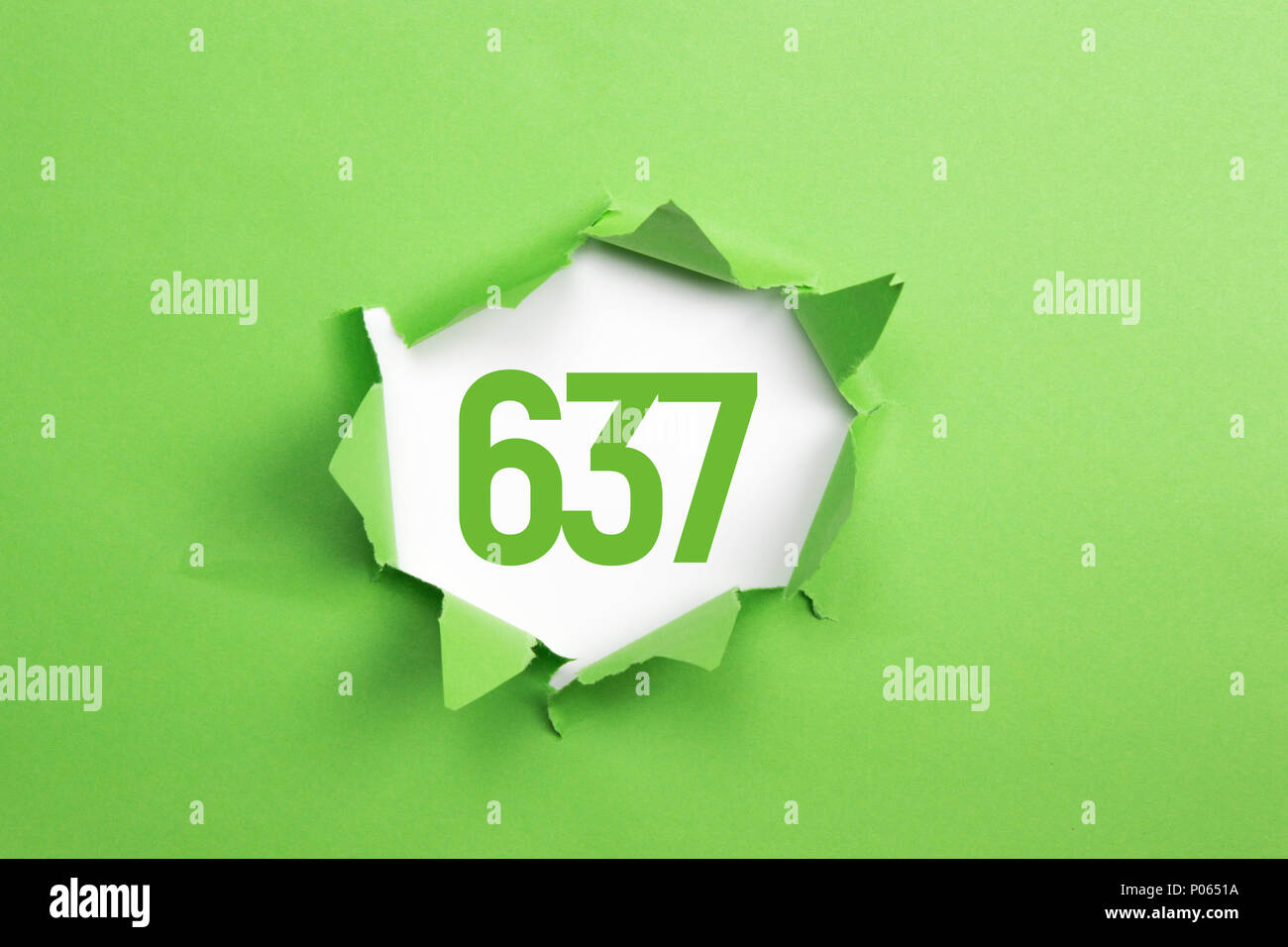 Green Number 637 on green paper background Stock Photo - Alamy