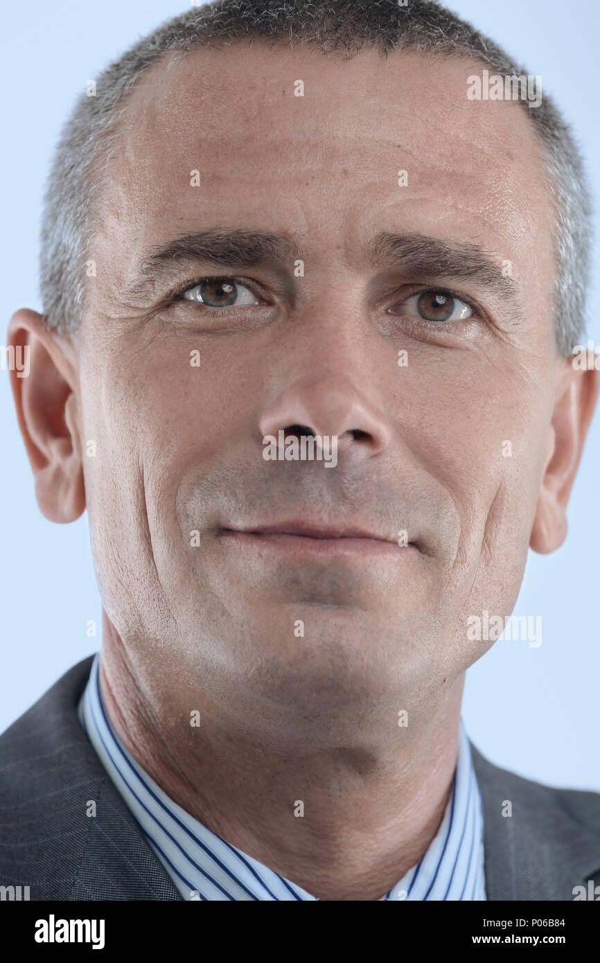 closeup face of a successful businessman Stock Photo - Alamy