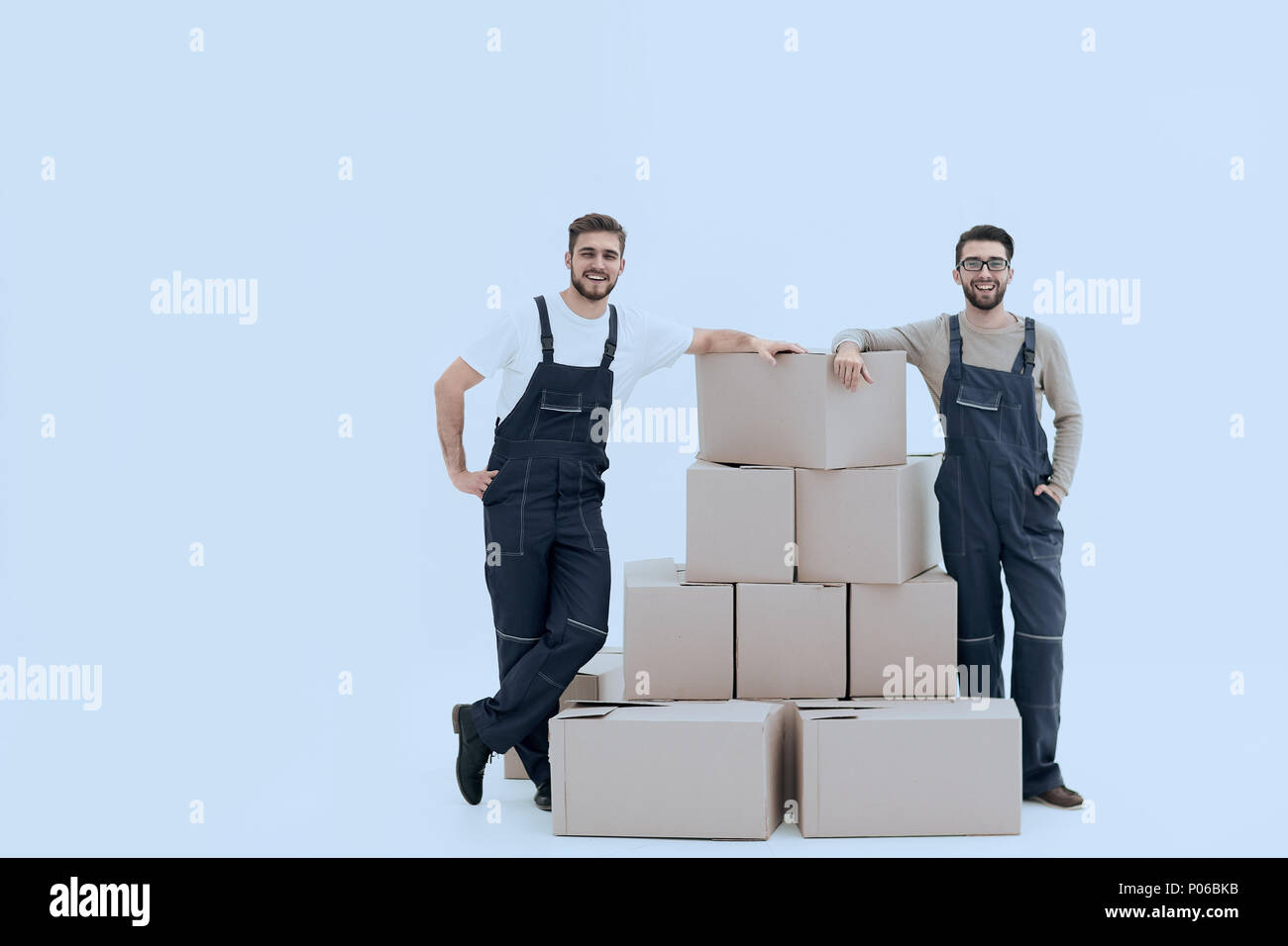Holding stack uniforms hi-res stock photography and images - Alamy