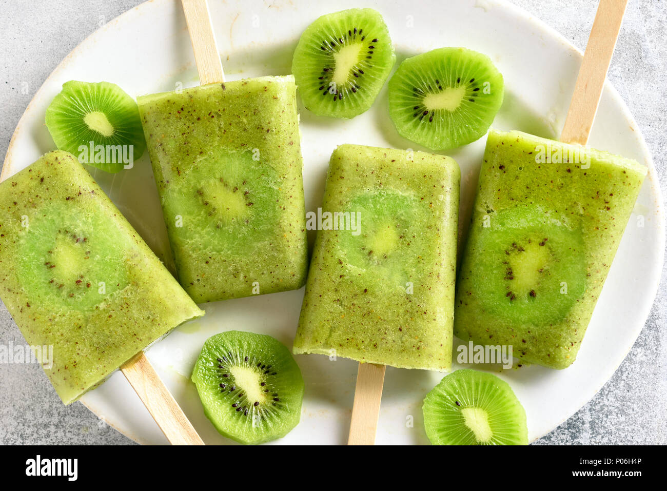 Close up of popsicles from kiwi. Top view, flat lay Stock Photo - Alamy