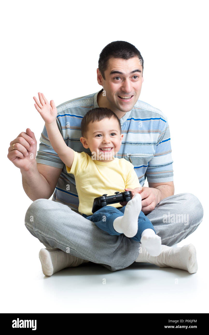 kid boy and his dad playing with a playstation together Stock Photo - Alamy