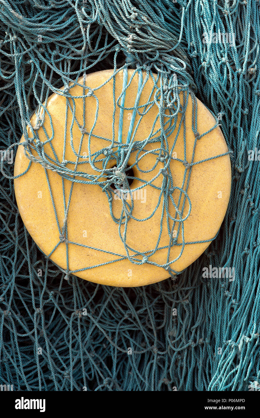 Close up of nylon fishing net with floater Stock Photo - Alamy