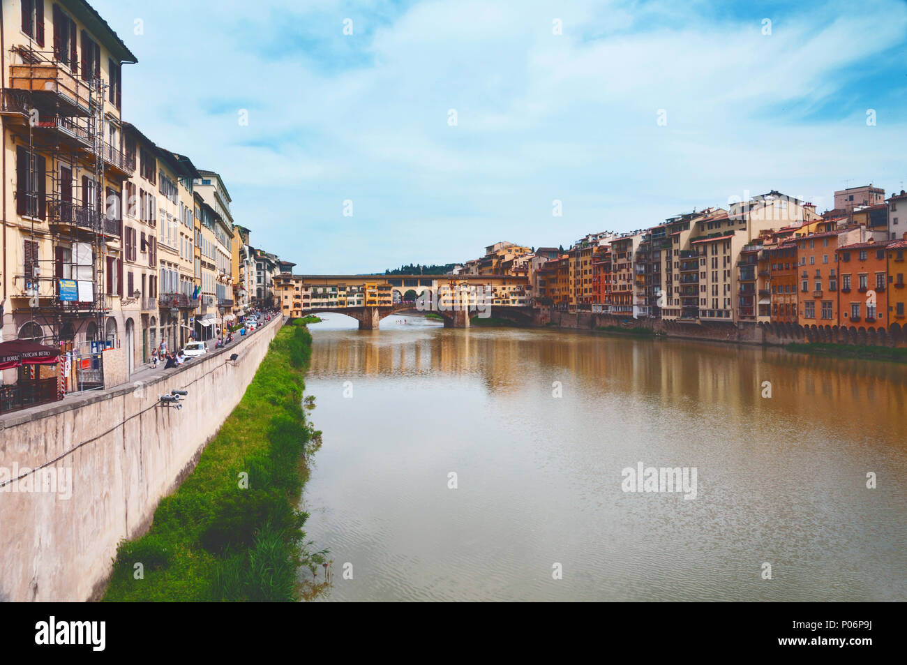 View of the Arno river, Bridge Ponte Vecchio and street. Florence ...