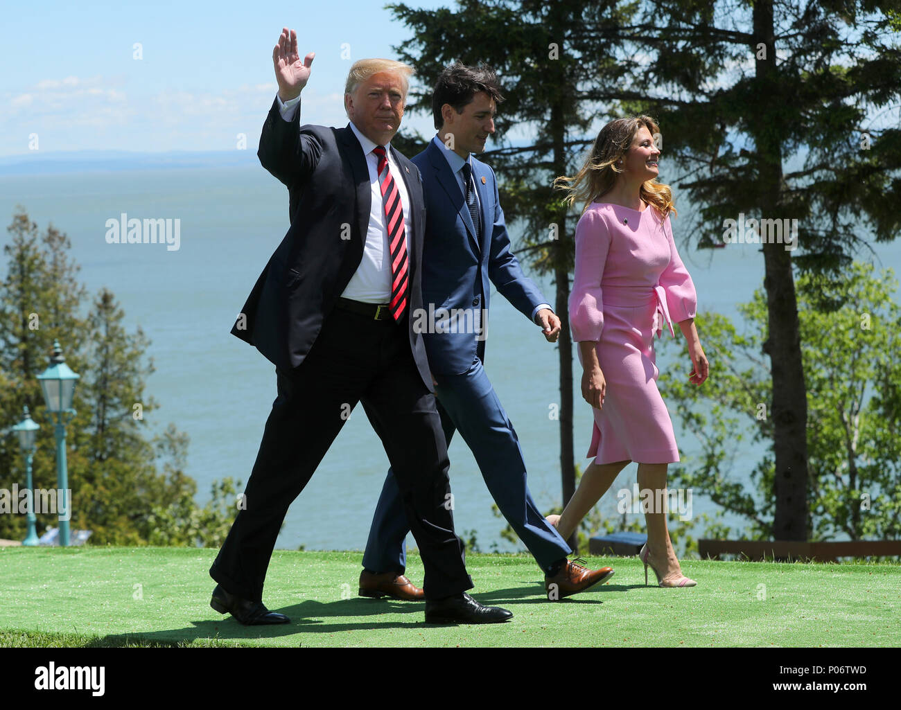 Quebec, Canada. 8th Jun, 2018. US President Donald Trump (l) is greeted ...