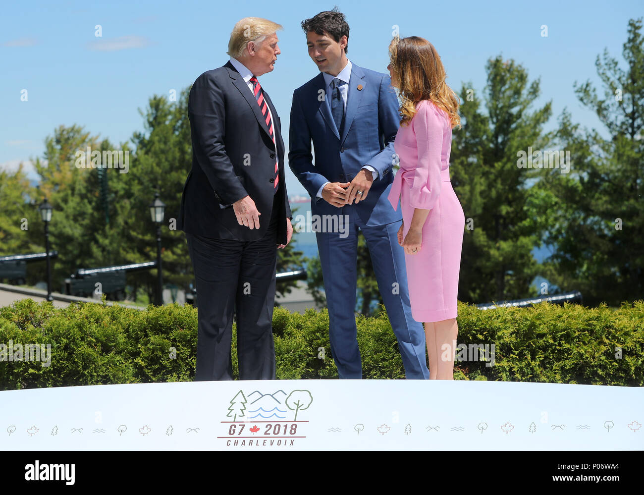 Quebec, Canada. 8th Jun, 2018. US President Donald Trump (l) is greeted ...