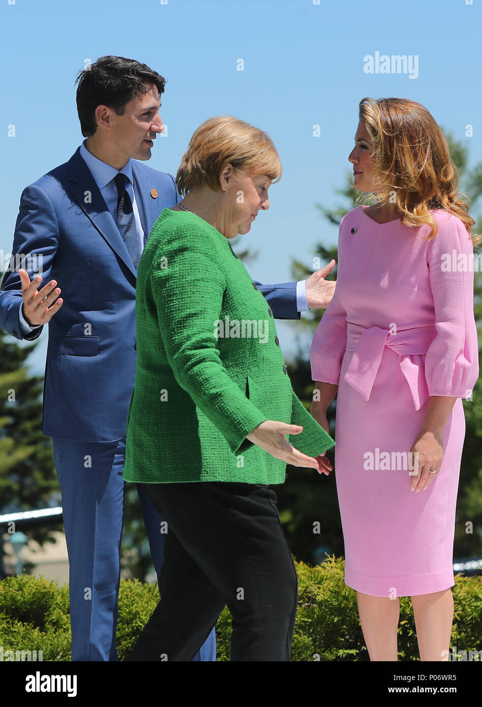 Quebec, Canada. 8th Jun, 2018. German Chancellor Angela Merkel (c) is ...