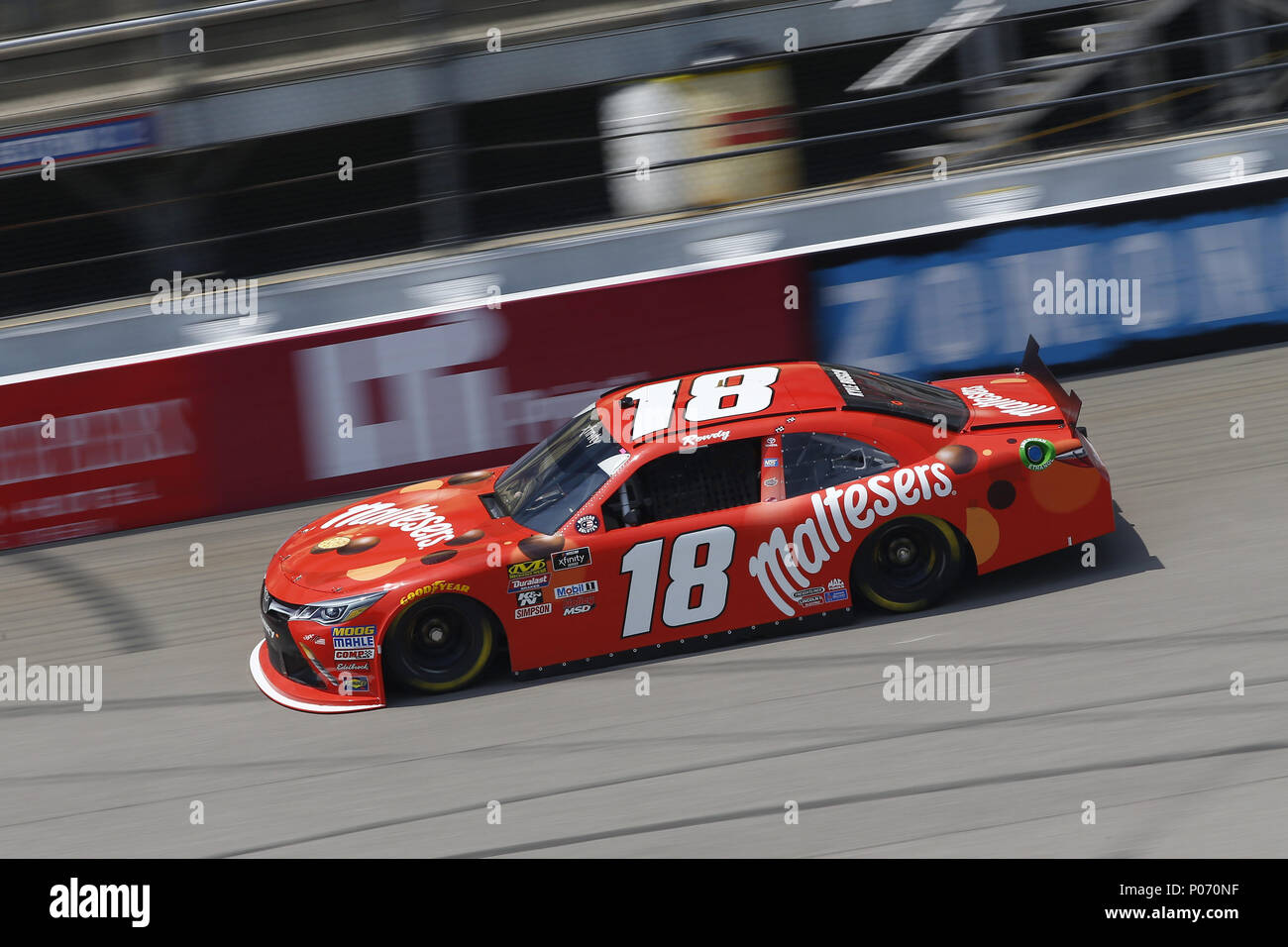 Brooklyn, Michigan, USA. 8th June, 2018. Kyle Busch (18) brings his ...